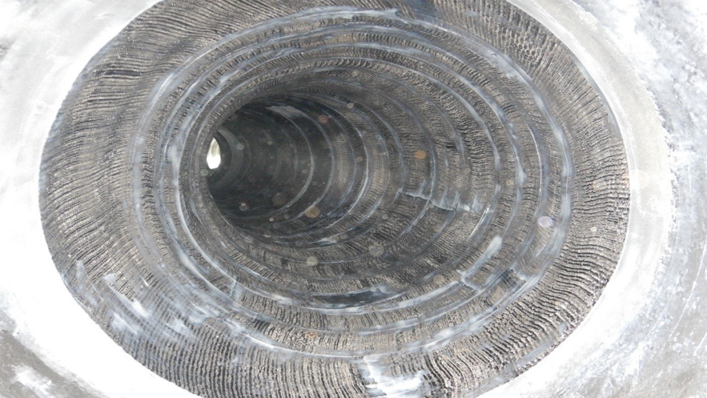 CFRP System Repairs Riveted Steel Penstock - Structural